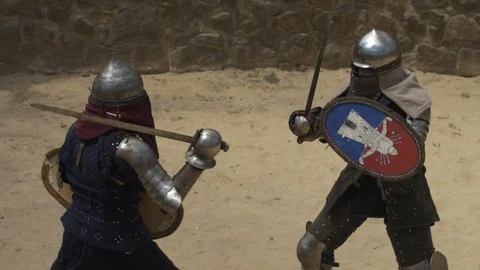 Raised sword over the head of fencing cr... | Stock Video | Pond5