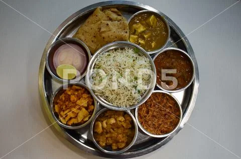 Photograph: Rajasthani Thali. Veg Full main course meal India. Maharaja ...