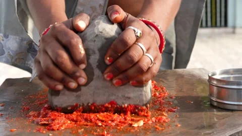 Rajasthani woman's hands are grinding ch... | Stock Video | Pond5
