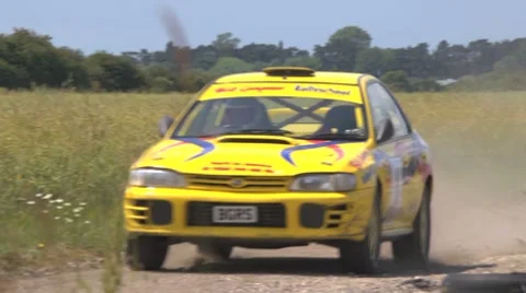 Rally car driving fast along a rough tra... | Stock Video | Pond5