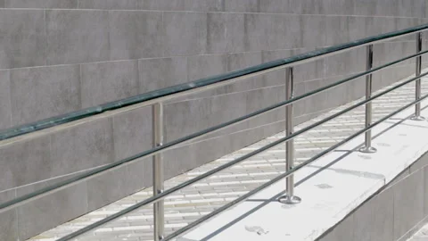 A ramp with stainless steel handrails fo... | Stock Video | Pond5