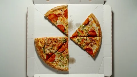 RANDOM: Whole Circle Of Big Pizza Is Eat... | Stock Video | Pond5