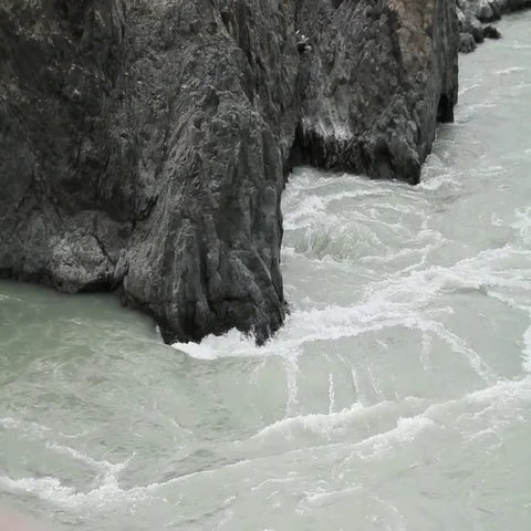 Rapid water flow. Water. Rock. Volcanic ... | Stock Video | Pond5