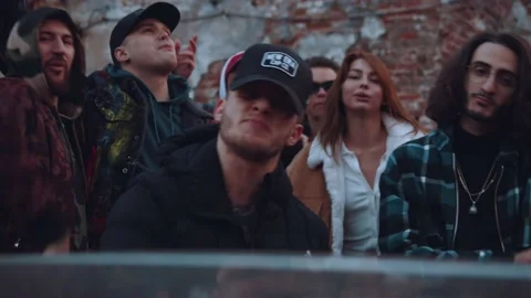 Rapper reads rap on the background of cr... | Stock Video | Pond5