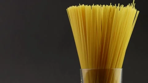 raw pasta spaghetti 4k isolated on black... | Stock Video | Pond5