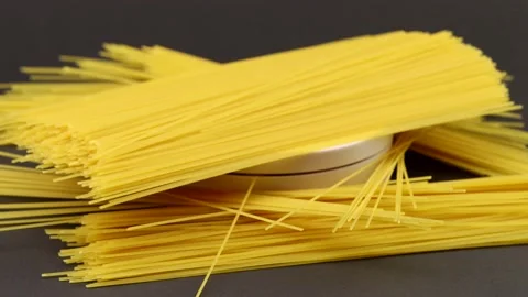 raw pasta spaghetti 4k isolated on black... | Stock Video | Pond5