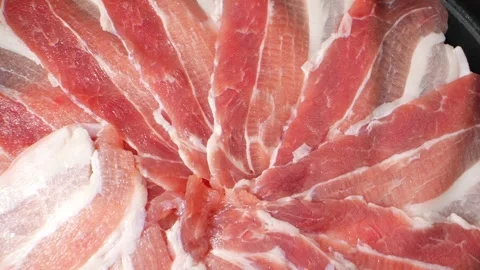 Raw pork belly slices: thin, marbled cut... | Stock Video | Pond5
