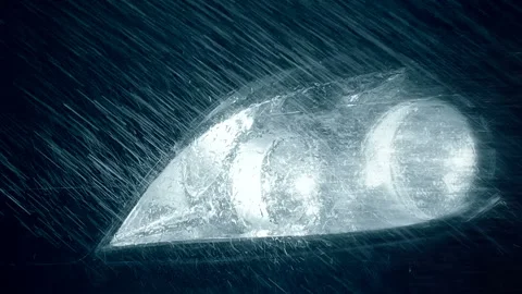 In the rays of headlight light of car ar... | Stock Video | Pond5