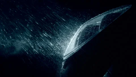 In the rays of headlight light of car ar... | Stock Video | Pond5