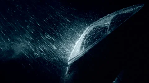 In the rays of headlight light of car ar... | Stock Video | Pond5