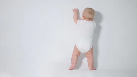reach the mind. 6 month old baby tapping... | Stock Video | Pond5