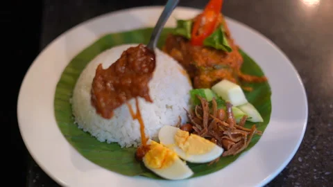 ready rice plate for eating with garnish... | Stock Video | Pond5