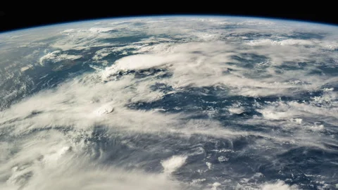 Real ISS View - Ocean Storm Emerges as E... | Stock Video | Pond5