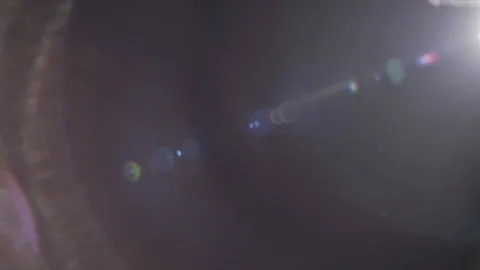 Real Lens Flare Form Spot Light And A... | Stock Video | Pond5