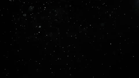 Real snow falling slowly in front of a b... | Stock Video | Pond5