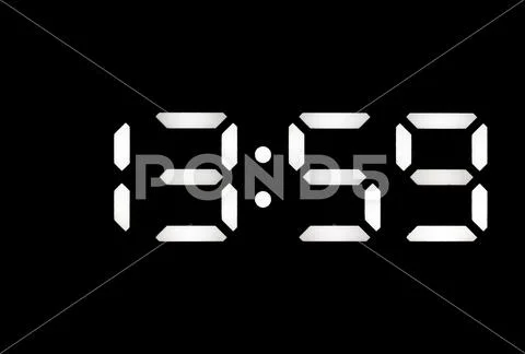 Photograph: Real white led digital clock on black background #142218037