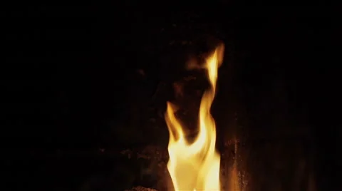 Real wood fire burning in a brick firepl... | Stock Video | Pond5