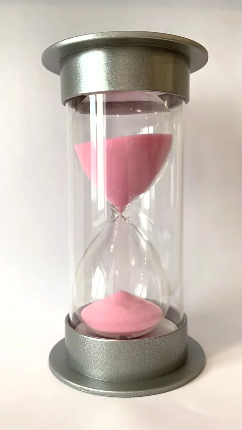 Realistic hourglass with pink sand, flow... | Stock Video | Pond5