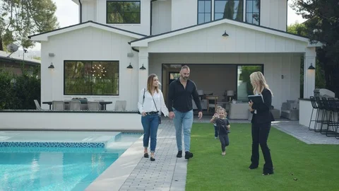 Realtor showing a new modern house to a ... | Stock Video | Pond5