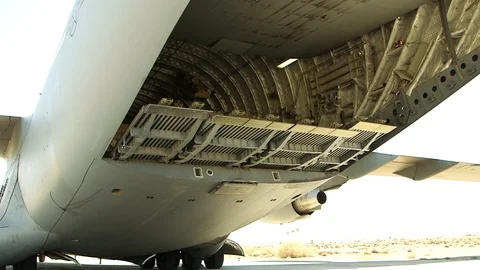 Rear cargo door ramps closing on C-17 Gl... | Stock Video | Pond5