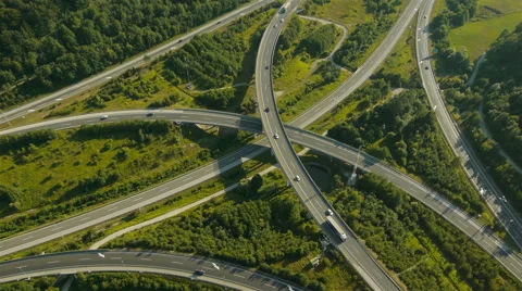 Rear Tilt-up Aerial view of Freeway Junc... | Stock Video | Pond5
