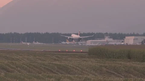 Rear view of Airbus A220-300 airplane la... | Stock Video | Pond5