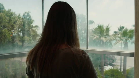 Rear view of beautiful woman in the tran... | Stock Video | Pond5