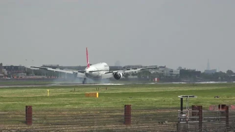 Rear view of a Boeing 777 landing at Lon... | Stock Video | Pond5