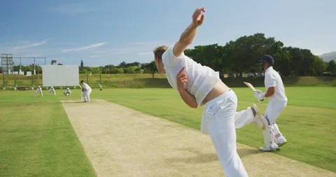 Rear view of cricket player throwing a b... | Stock Video | Pond5