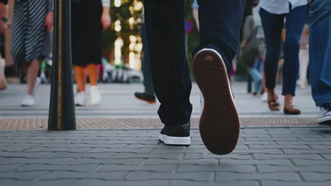 Rear view follow male feet steps crossin... | Stock Video | Pond5