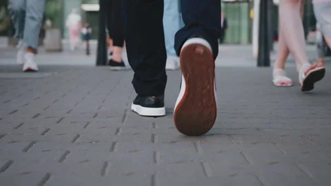 Rear view follow male feet steps crossin... | Stock Video | Pond5