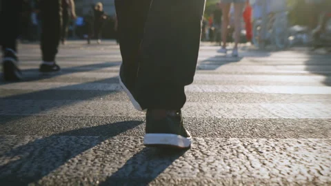 Rear view follow male feet steps crossin... | Stock Video | Pond5