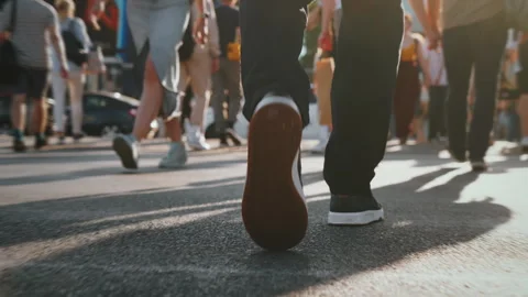 Rear view follow male feet steps crossin... | Stock Video | Pond5