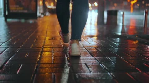 Rear view of the legs of a girl walking ... | Stock Video | Pond5