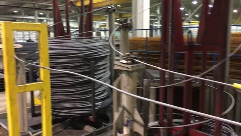 Rebar Uncoiling to Worker | Stock Video | Pond5