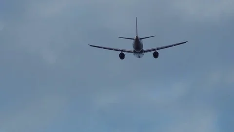 Receding airplane in blue sky | Stock Video | Pond5