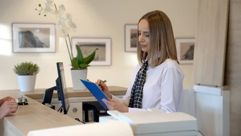 Hotel Face Desk Stock Footage ~ Royalty Free Stock Videos | Pond5