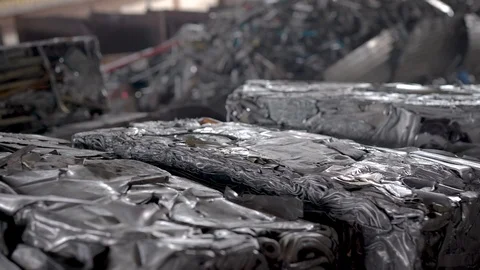 Recycling scrap metal. In the frame briq... | Stock Video | Pond5