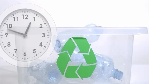 Recycling sign and clock | Stock Video | Pond5