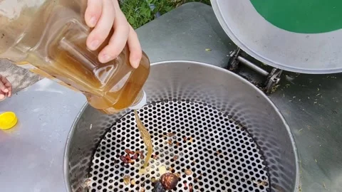 Recycling spent vegetable cooking oil in... | Stock Video | Pond5