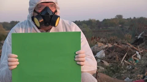 Recycling worker hold green screen | Stock Video | Pond5