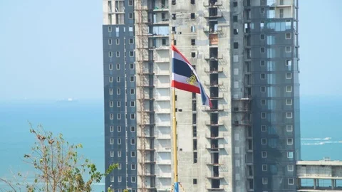 red and blue flag building at pattaya vi... | Stock Video | Pond5