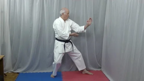 On red and blue tatami old man athlete i... | Stock Video | Pond5