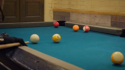 Red and white spotted balls hitting corn... | Stock Video | Pond5