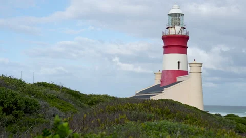 The red and white striped light tower of... | Stock Video | Pond5