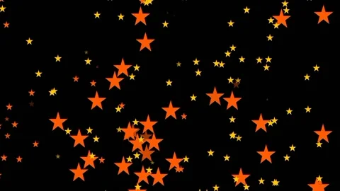 Red and yellow colour stars dropping on ... | Stock Video | Pond5