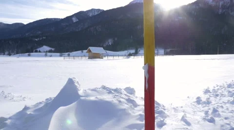 Red and yellow snow pole in a winter bac... | Stock Video | Pond5