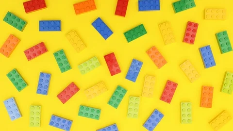 Red, blue, yellow and green bricks blink... | Stock Video | Pond5