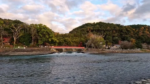 Red Bridge at Uji, Kyoto. Beautiful aut... | Stock Video | Pond5