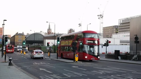 Red bus ouside the Kings Cross St Pancra... | Stock Video | Pond5